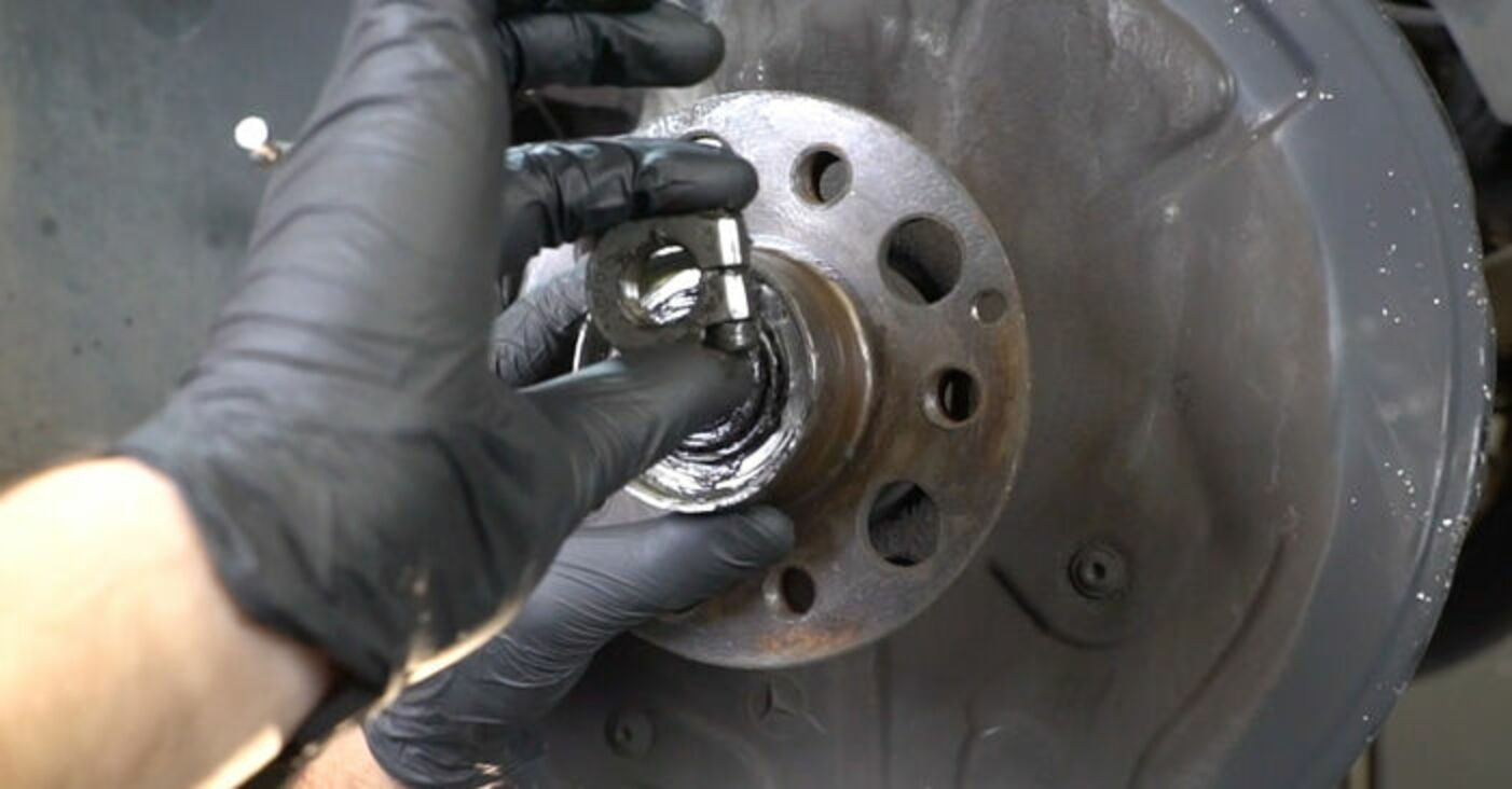 How to change front wheel bearing on Mercedes W211 – replacement guide