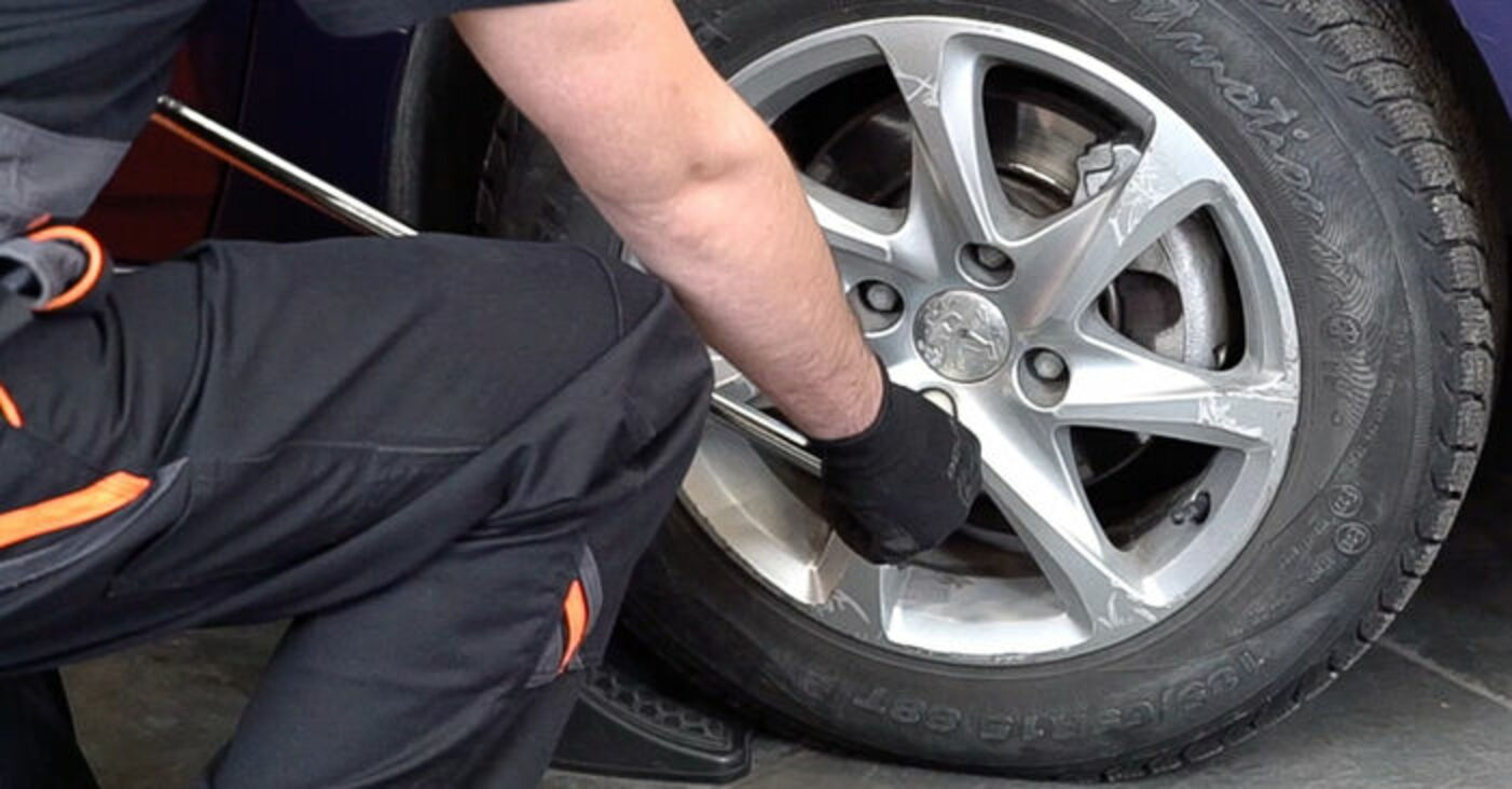 How to change front suspension strut on Peugeot 208 1 – replacement guide