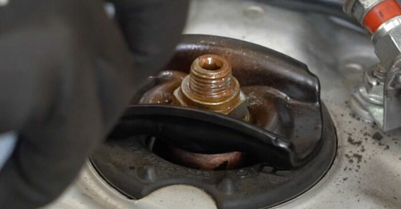 How to change front strut mount on Mercedes W203 – replacement guide