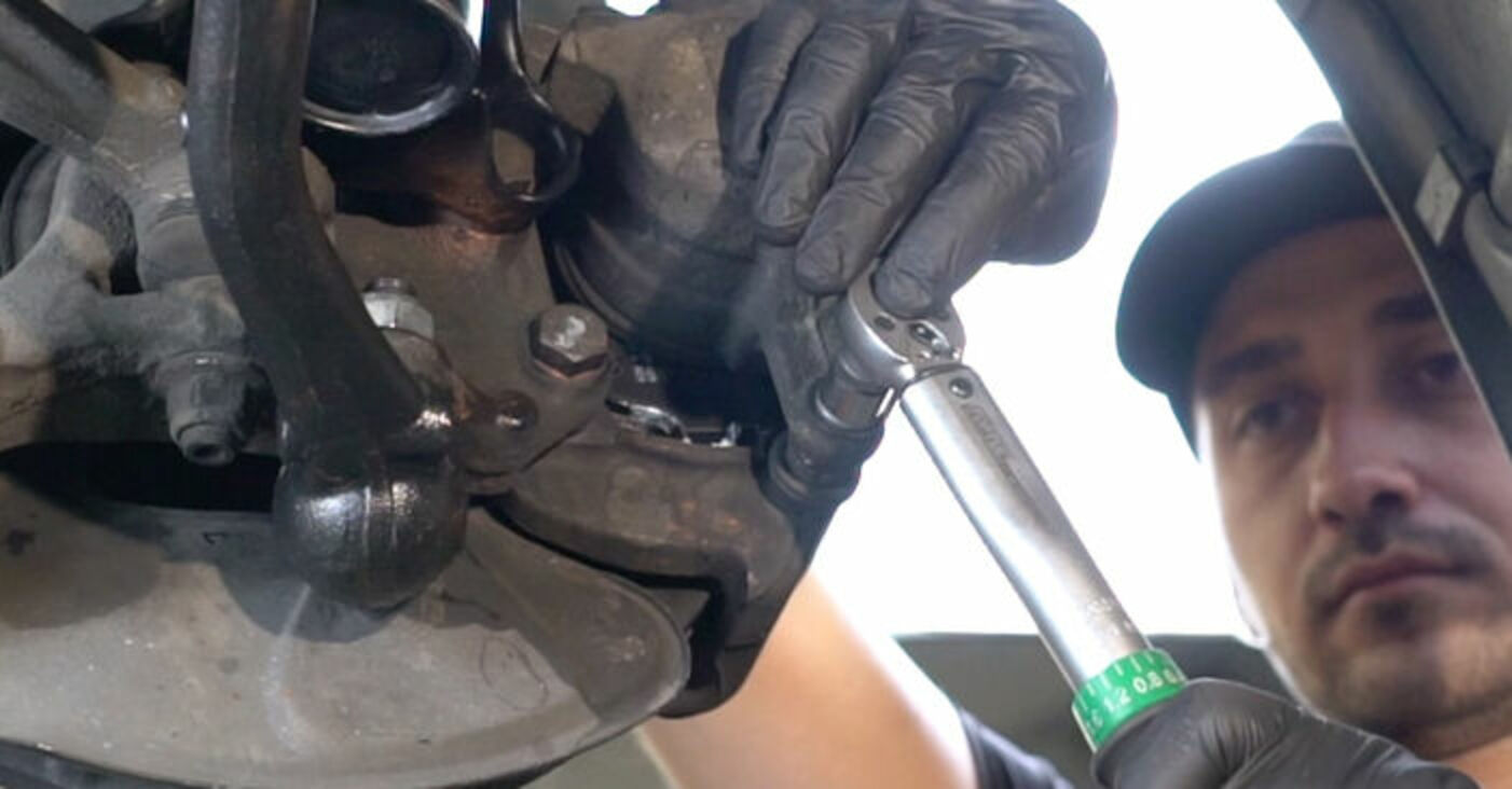 How to change front brake discs on Mercedes W203 – replacement guide