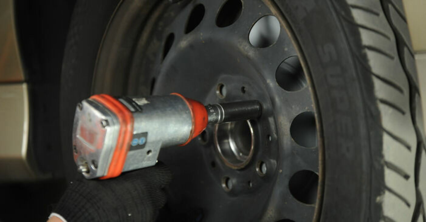 How to change front suspension strut on BMW E90 – replacement guide