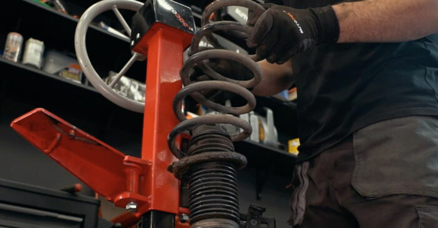 How to change front suspension strut on VW Passat B7 saloon ...
